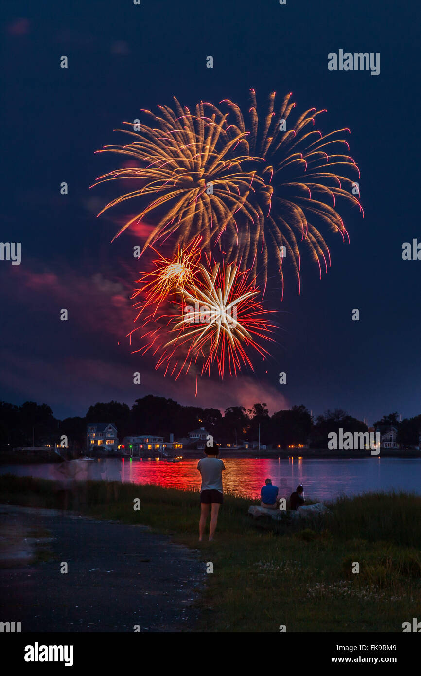 Fireworks with people celebrating 4th of July seen in Norwalk park ...