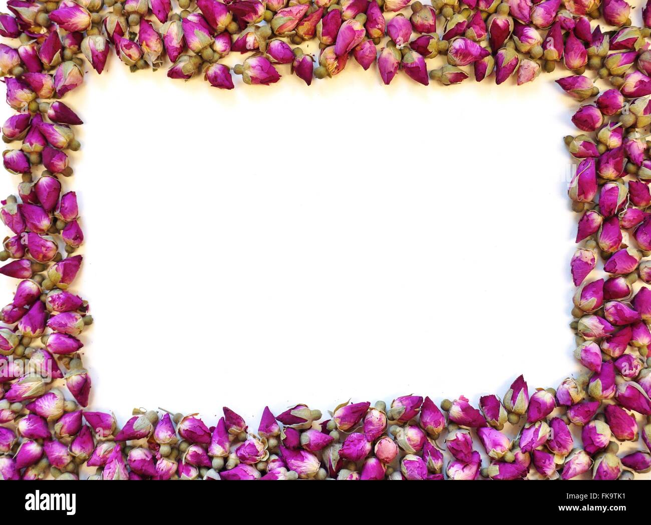 Border frame of romantic dried pink rose buds Stock Photo - Alamy