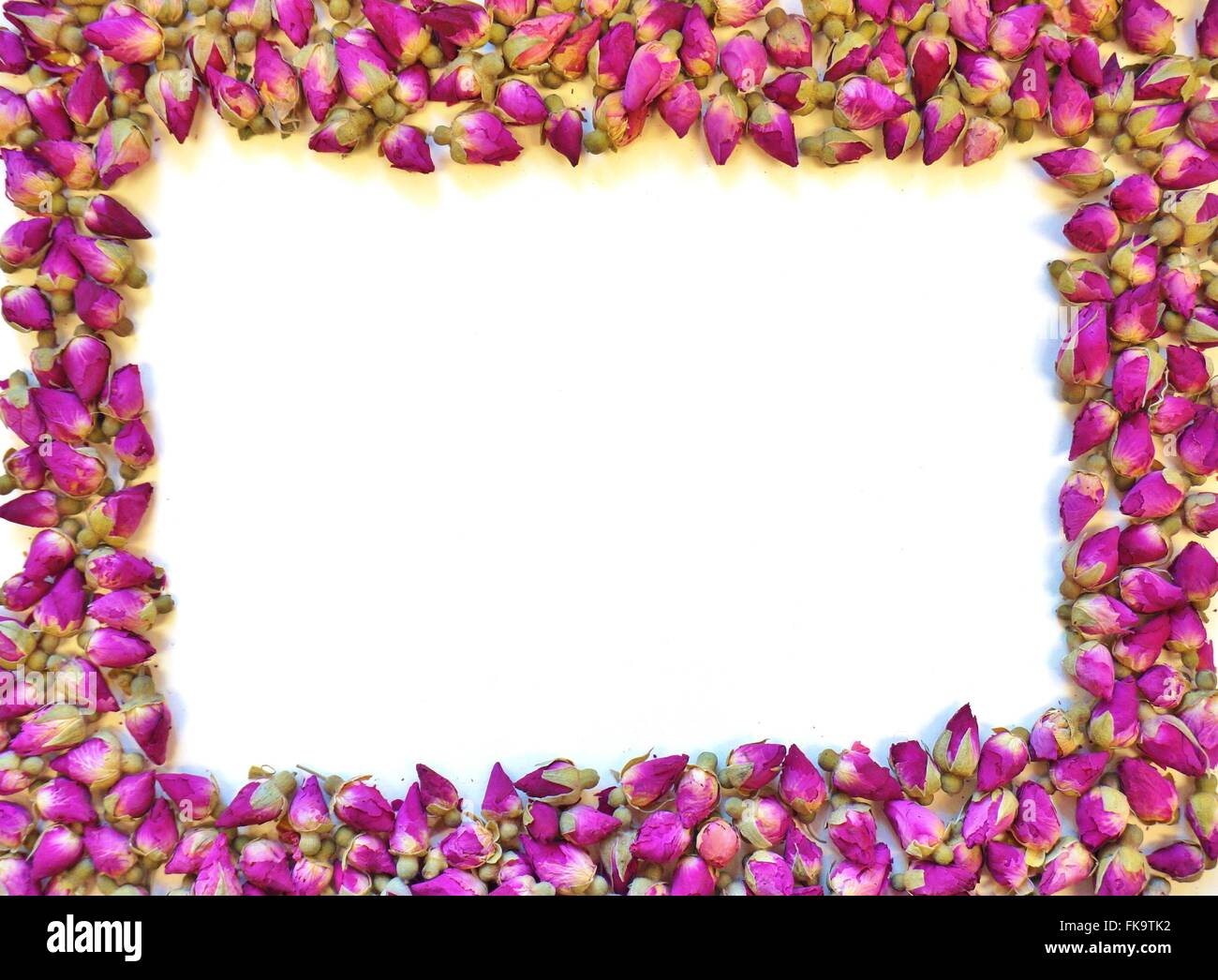 Border frame of romantic dried pink rose buds Stock Photo - Alamy