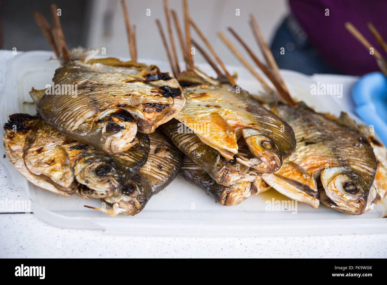 Roast fish skewers sale at the Fish Market Stock Photo - Alamy
