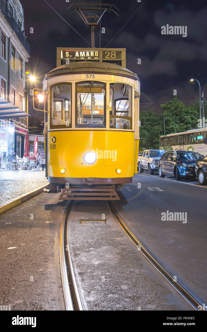 Electric tram at night Stock Photo - Alamy
