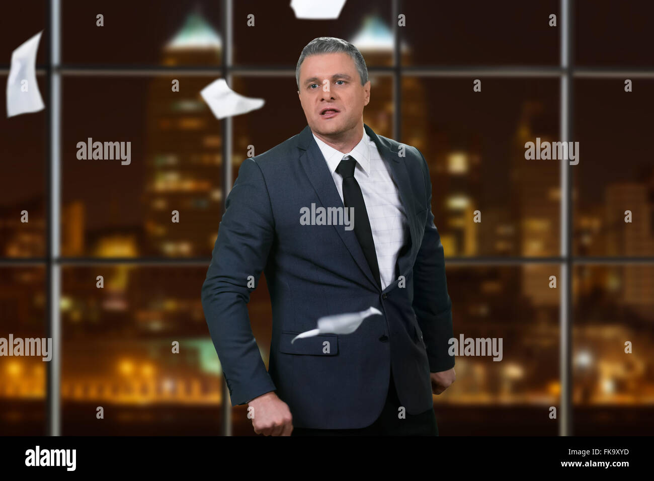 Angry businessman at the office Stock Photo - Alamy