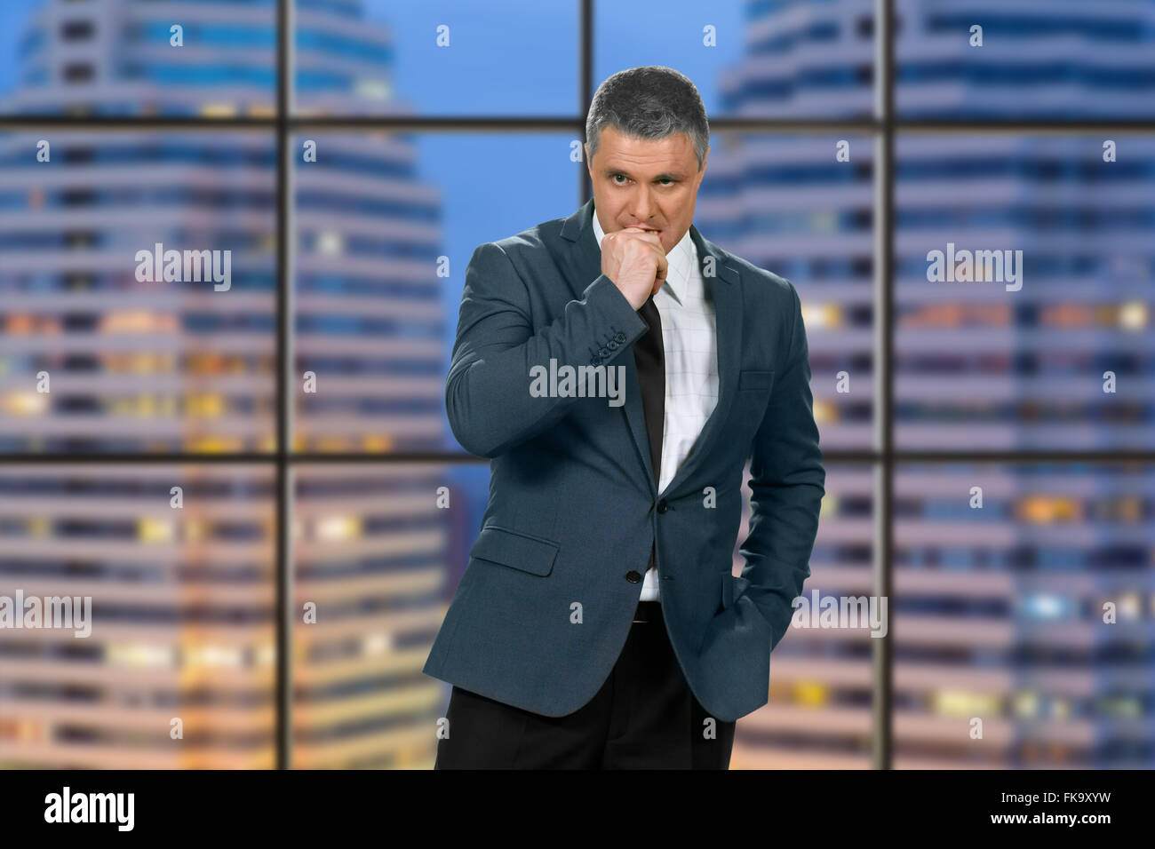 Evening of distressed businessman Stock Photo - Alamy