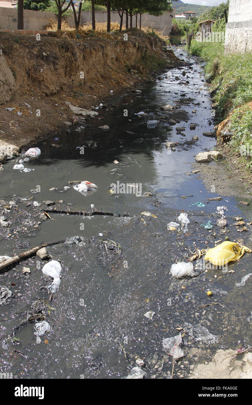 Polluted creek in the city center Stock Photo - Alamy