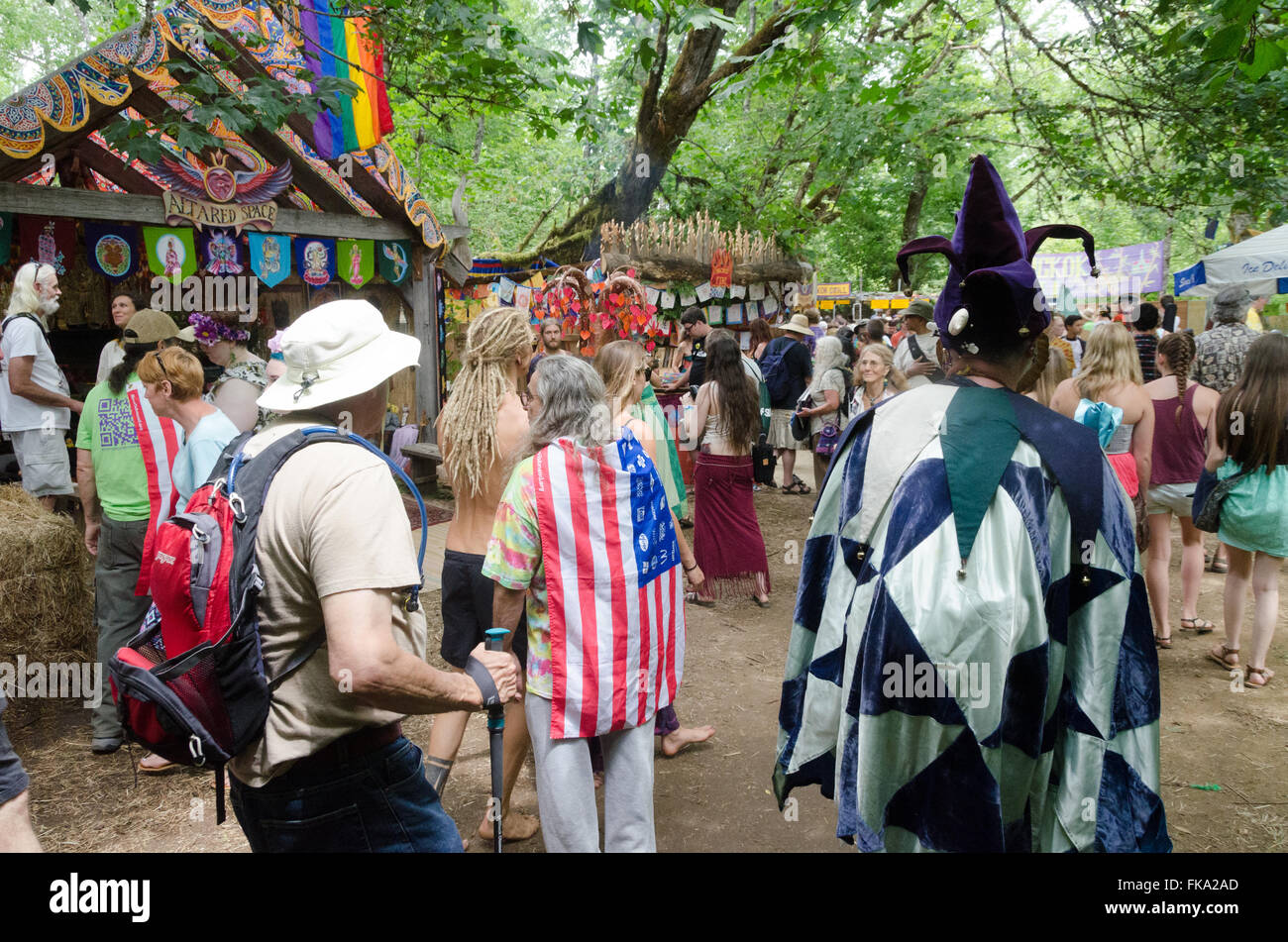 Visitors wander through one of many wooded lanes an the Oregon Country ...