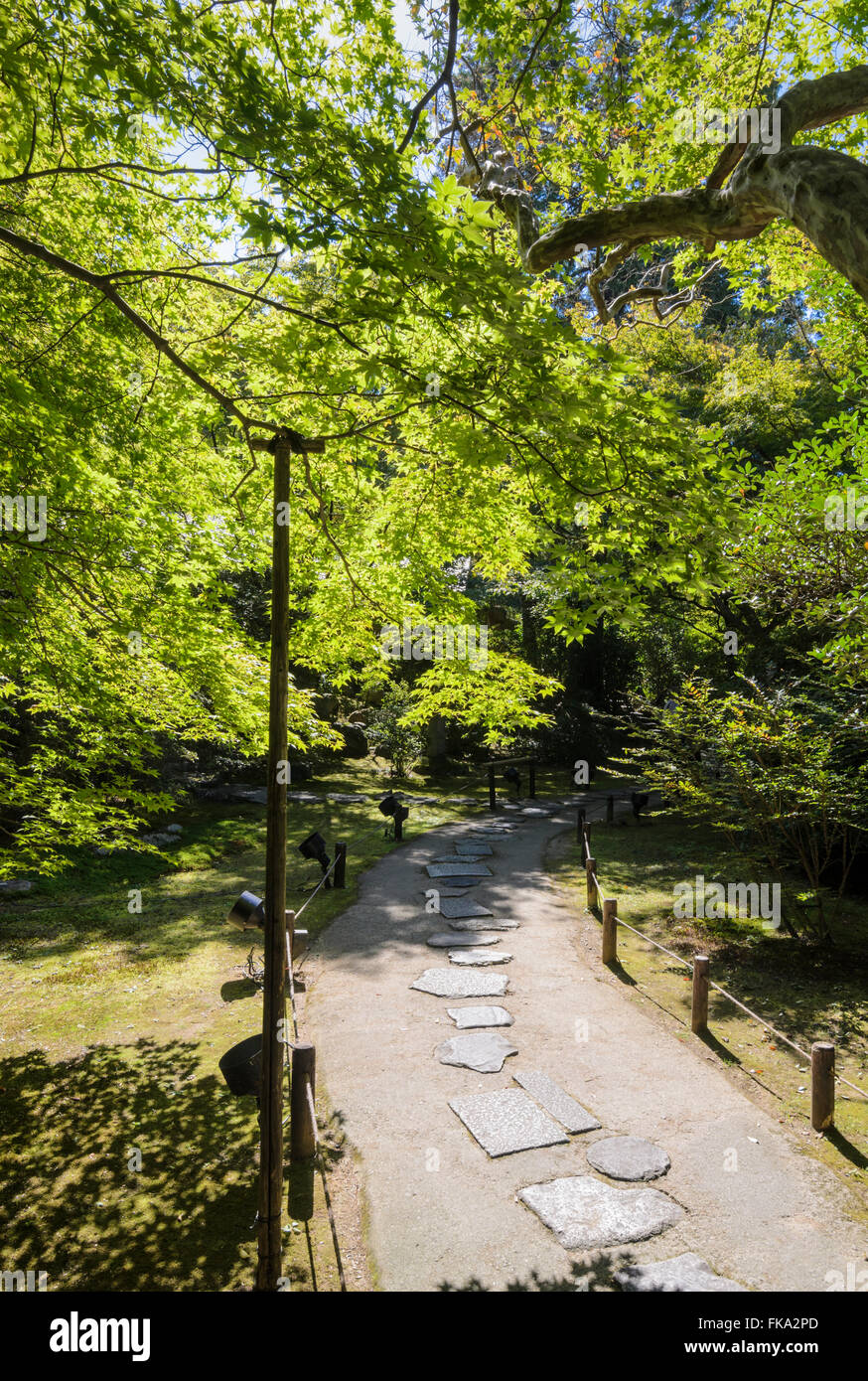 Winding tree covered path through the gardens of the Buddhist Shorenin ...