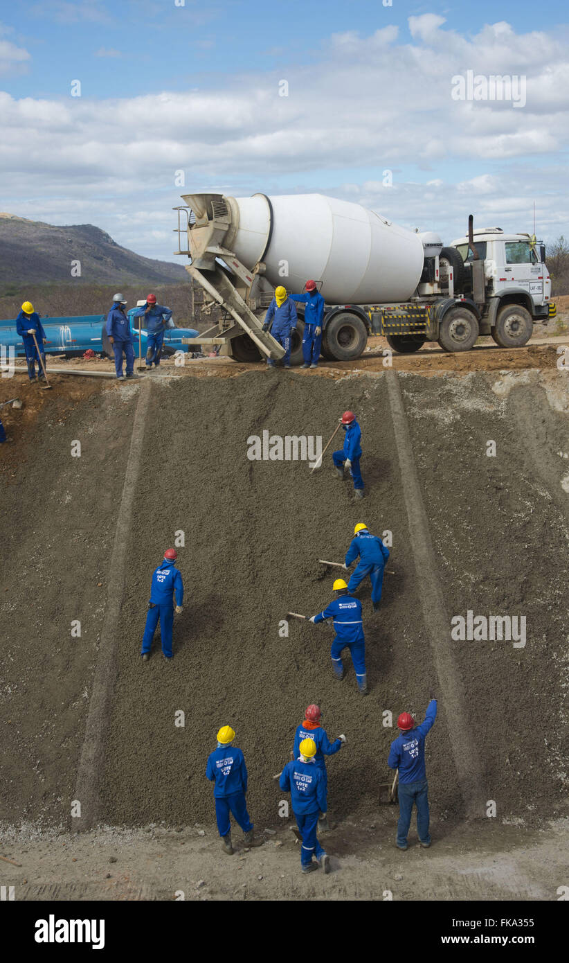 Operarios compacting soil cement in the channel - Sao Francisco river ...