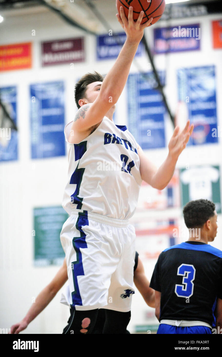 Player getting off an uncontested shot from just under the hoop during ...