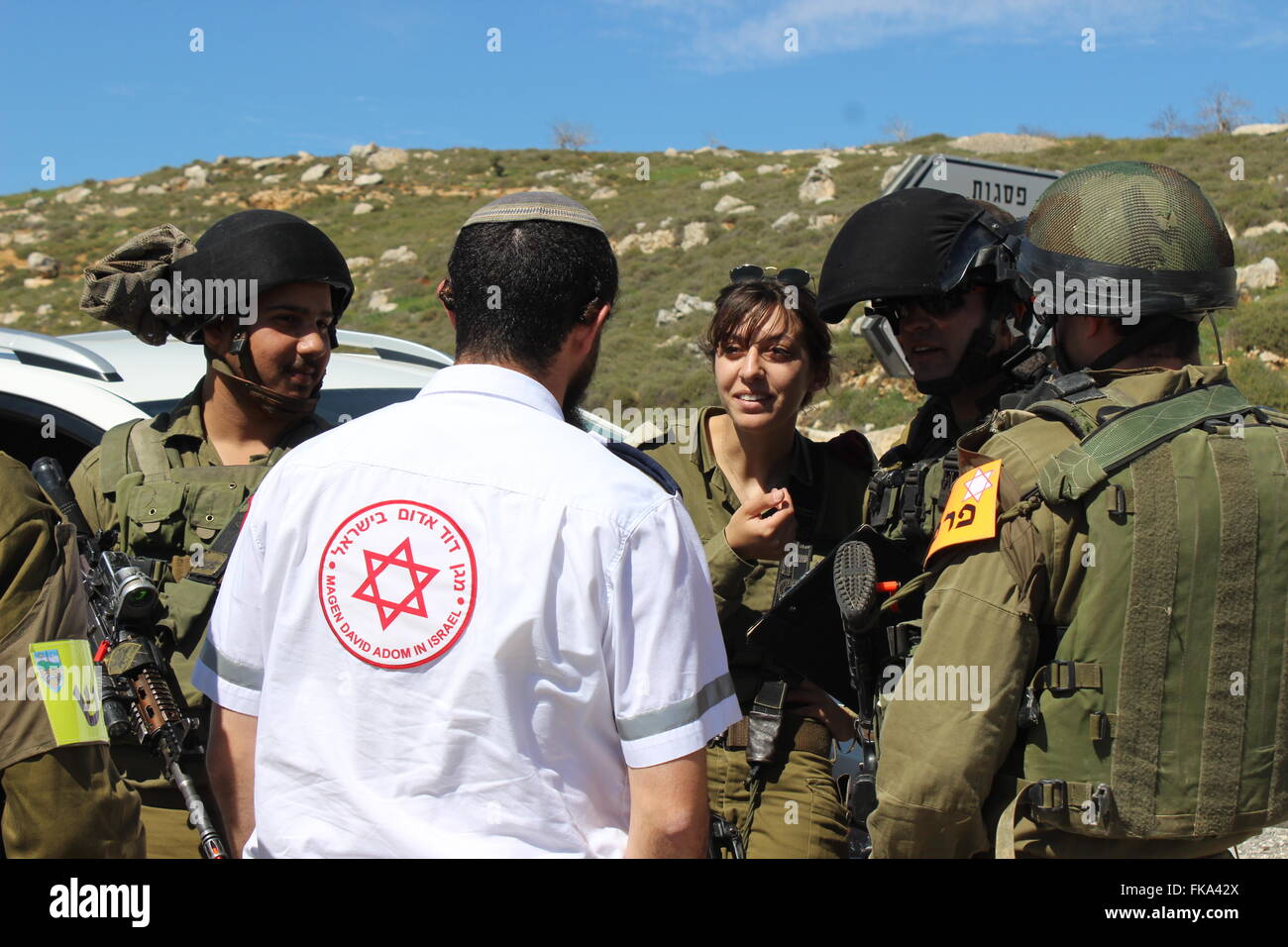 Beit El, Israel. 29th Feb, 2016. Captain Paz Rokach discussing with a ...