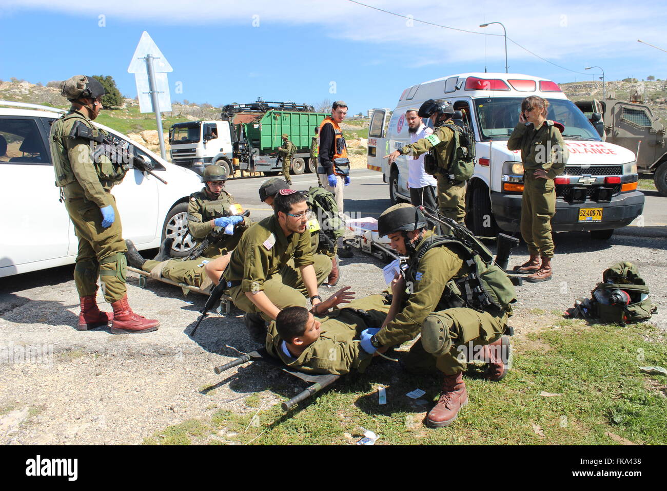 Beit El, Israel. 29th Feb, 2016. Captain Paz Rokach (r) on the phone ...