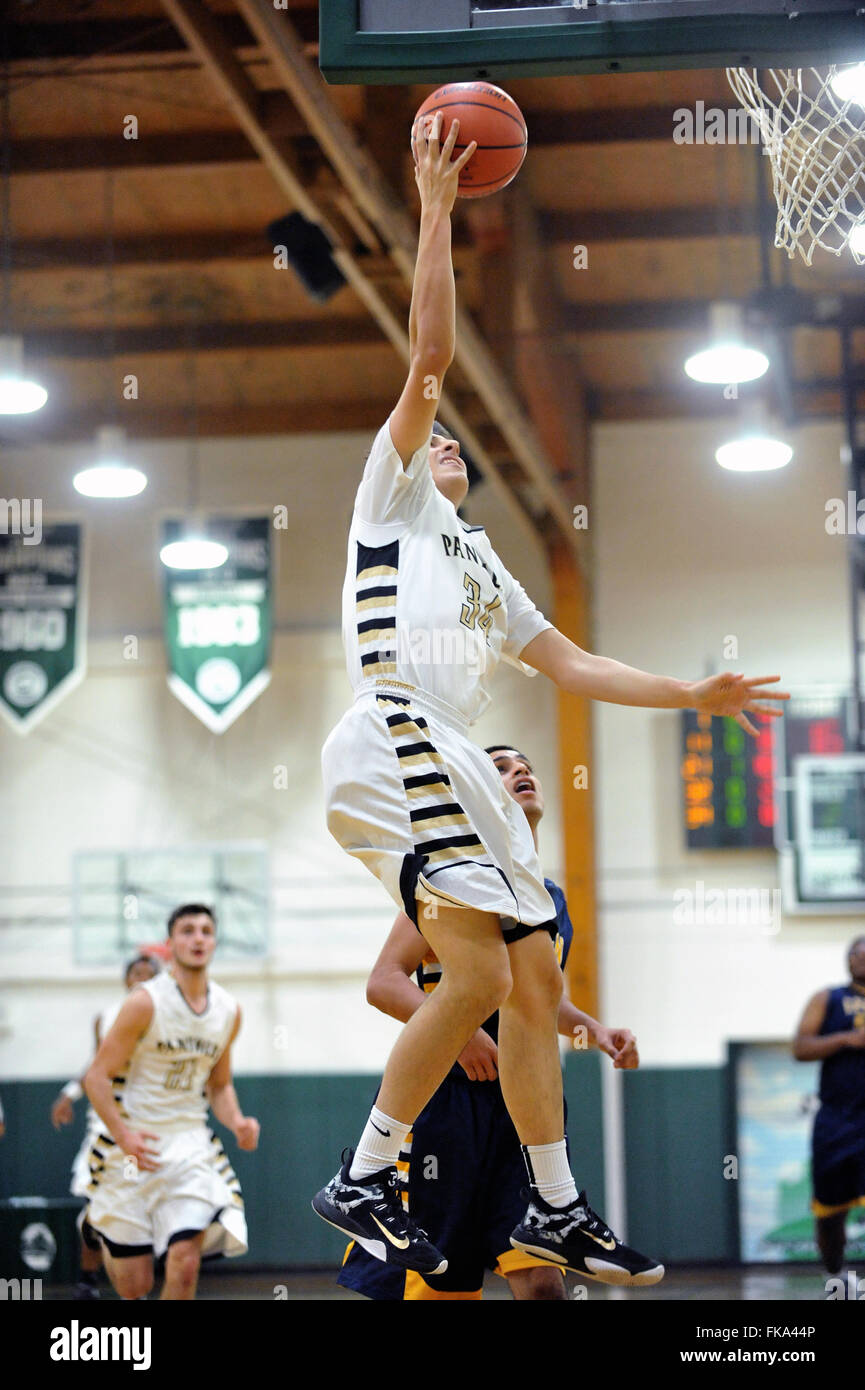 A player takes the high road to the hoop while executing an uncontested ...