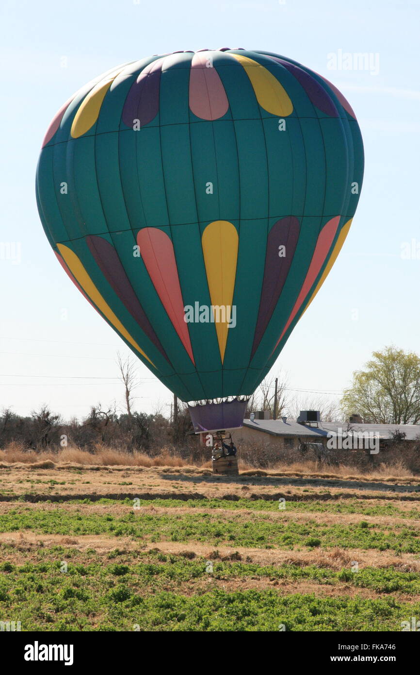 Hot air balloon landing in hi-res stock photography and images - Alamy