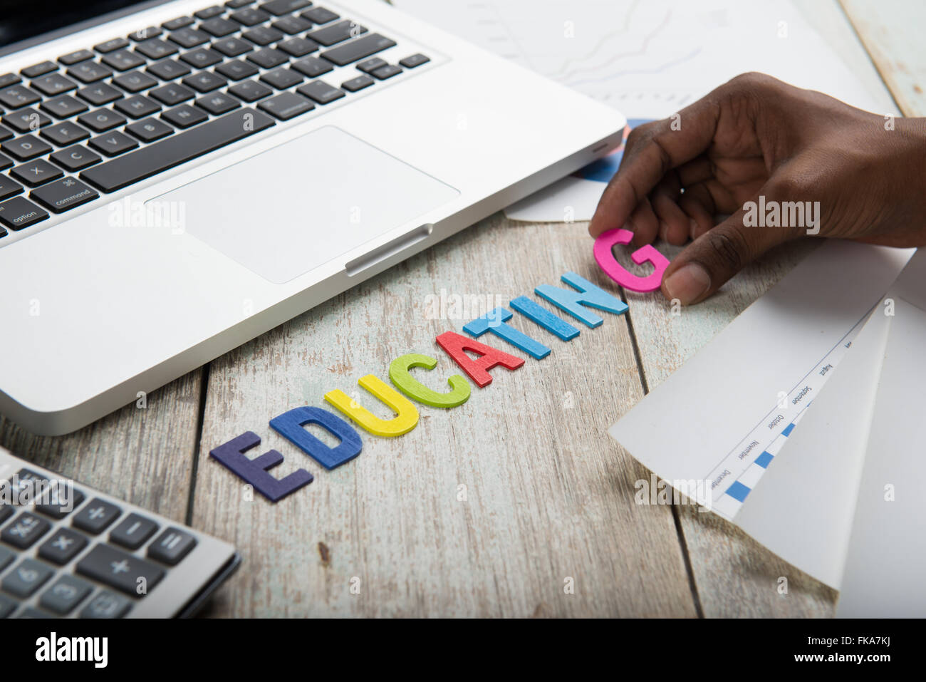 educating word with hands arrangement and fiancial concept Stock Photo ...