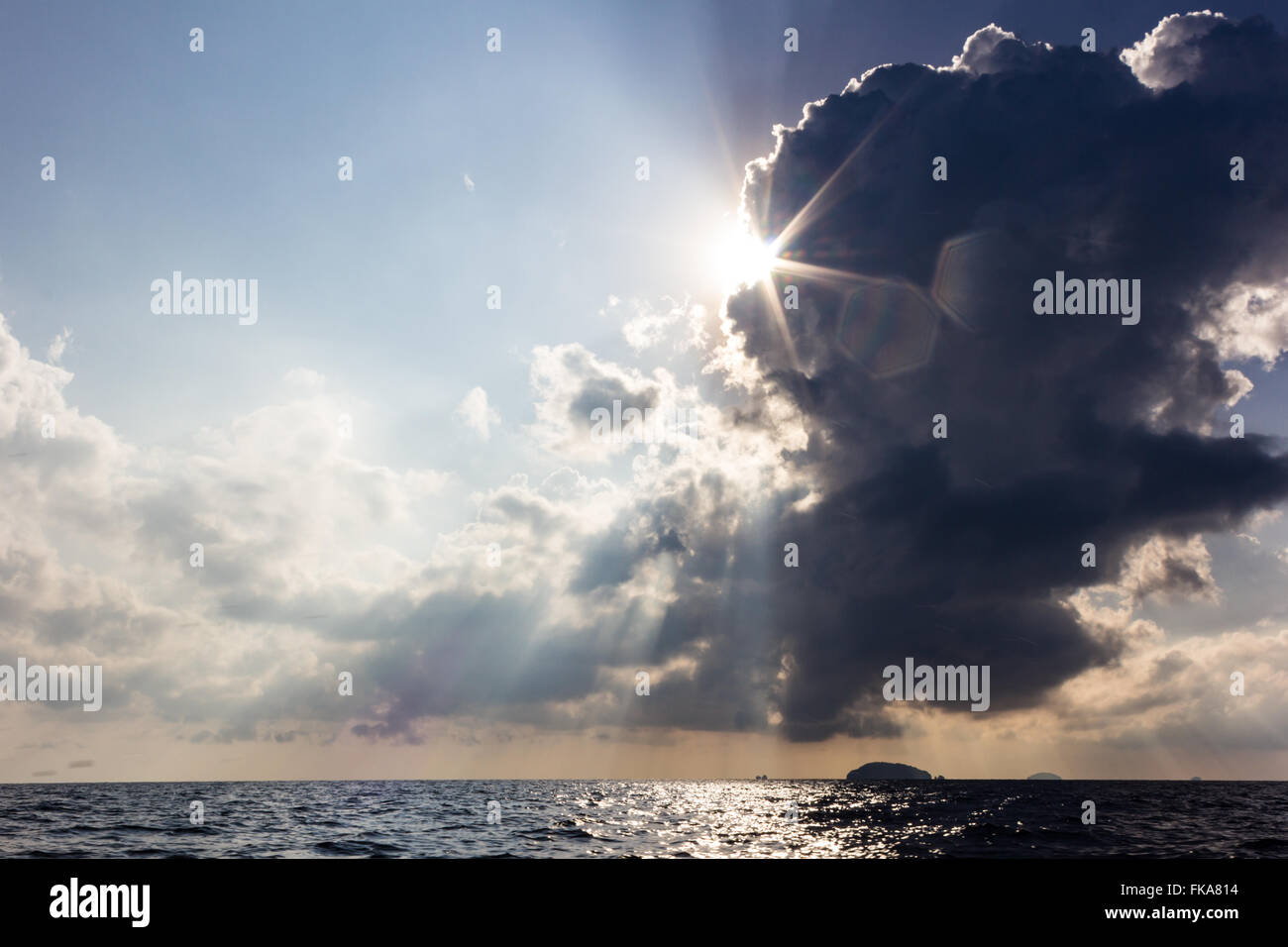 Amazing light behind the clouds Stock Photo - Alamy