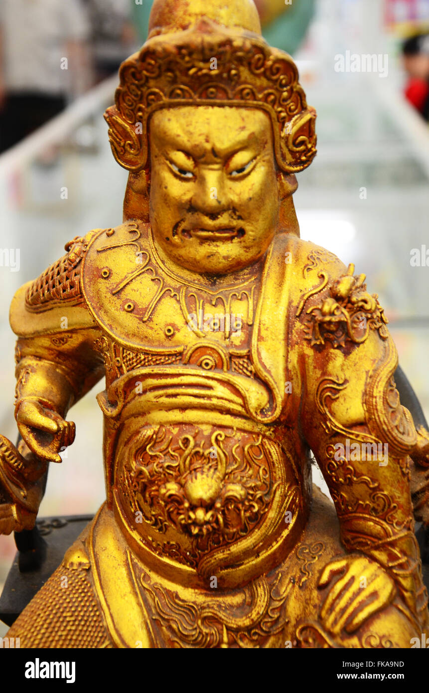 Wood carved Statue of Guan Yu chinese god of honor Stock Photo - Alamy