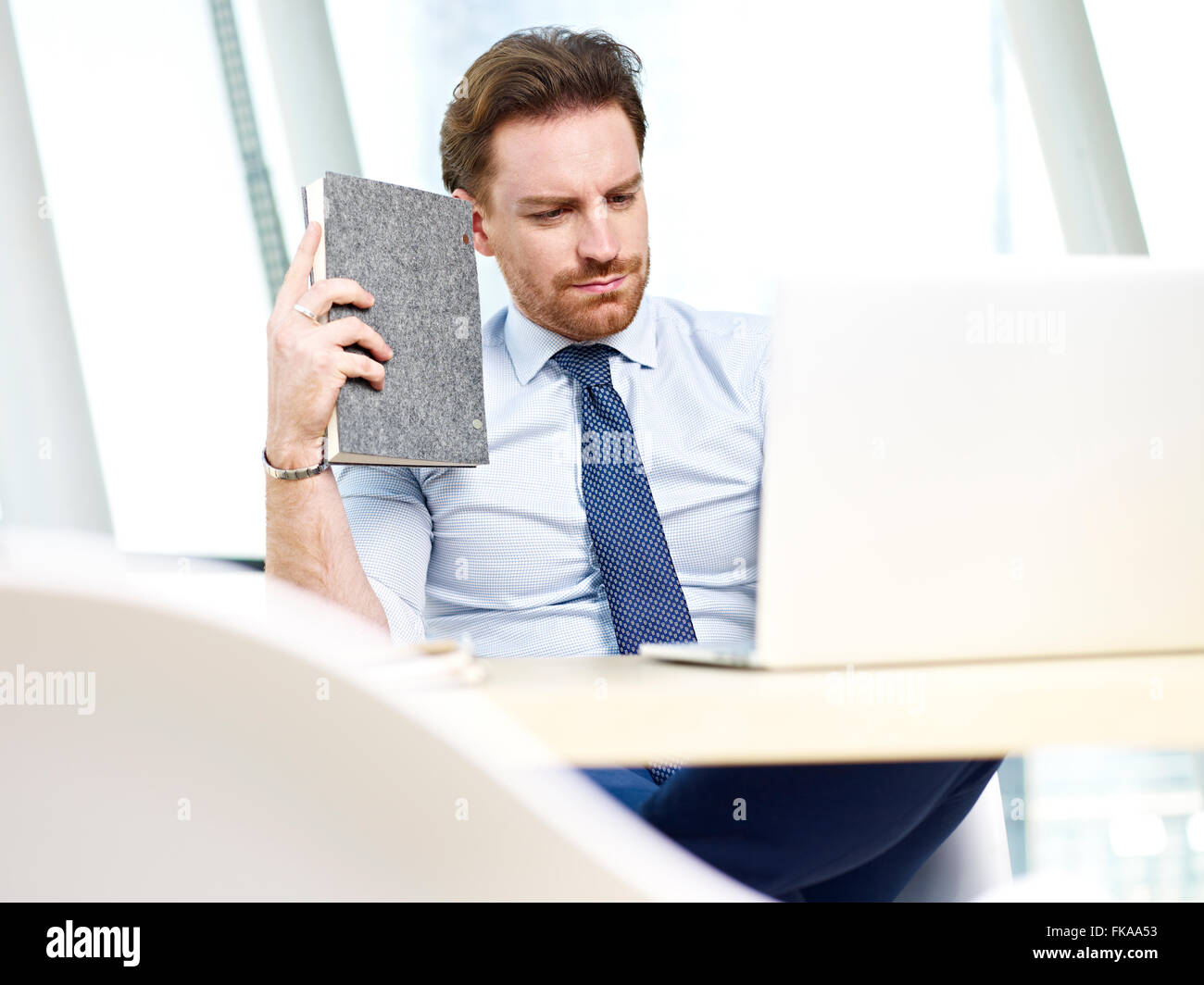 corporate person working thinking in office Stock Photo - Alamy