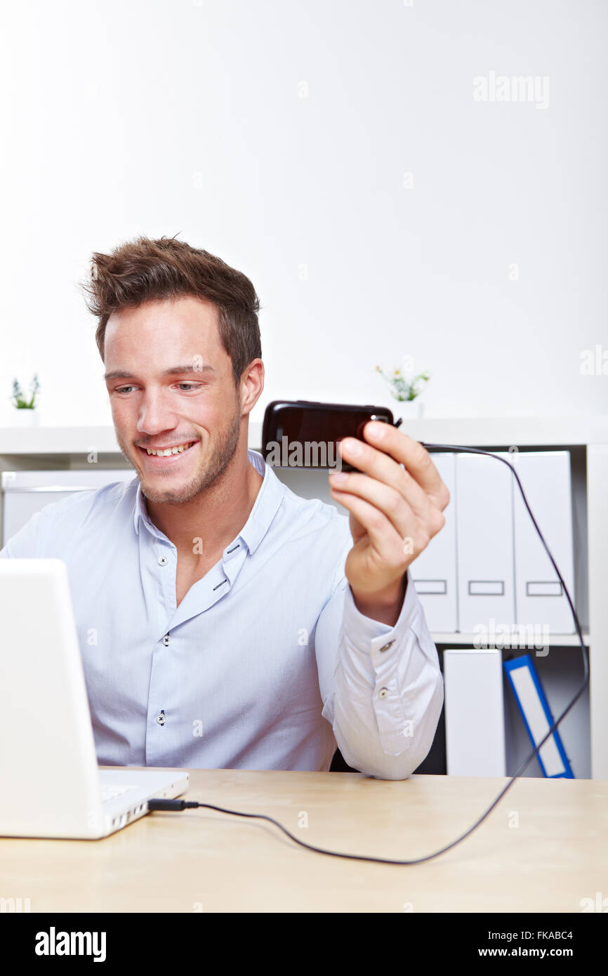 Transfer photos from phone to computer hi-res stock photography and ...