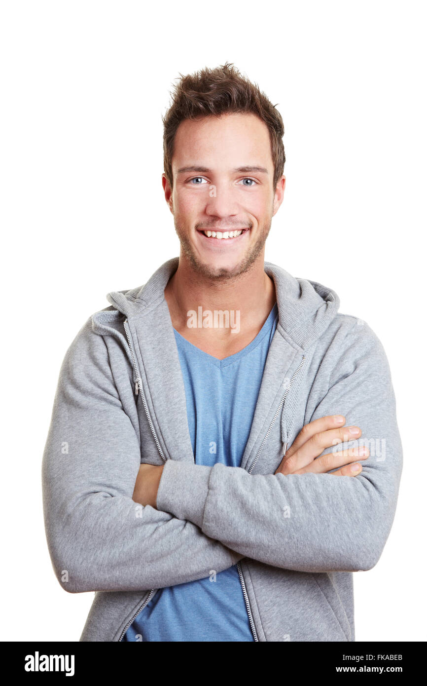Happy man smiling with his arms crossed Stock Photo - Alamy