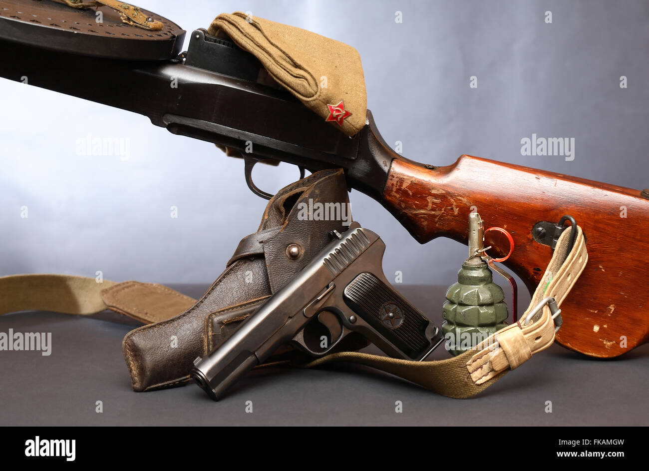 World War II Soviet equipment. Set of various soviet weapons on dark ...