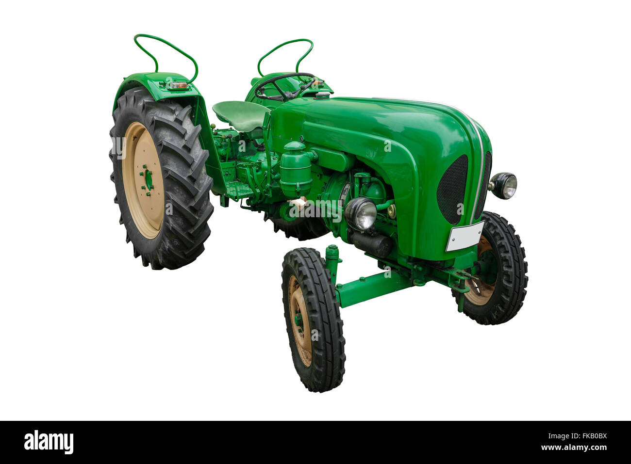 green tractor isolated on white background Stock Photo - Alamy
