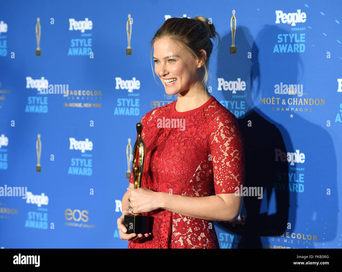Munich, Germany. 07th Feb, 2016. Israeli Model Bar Refaeli holds up her ...