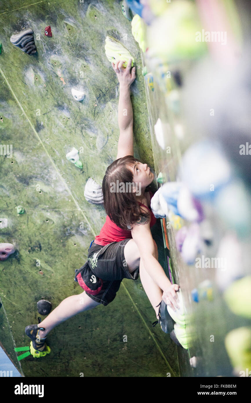 Climbers take part in a bouldering competition at The Climbing Academy ...
