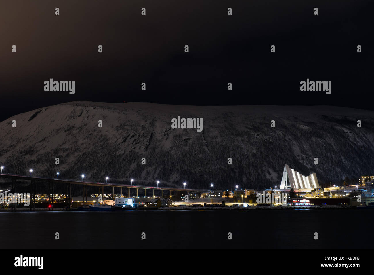 Tromsø landscape at night, overlooking the Arctic Cathedral Stock Photo ...