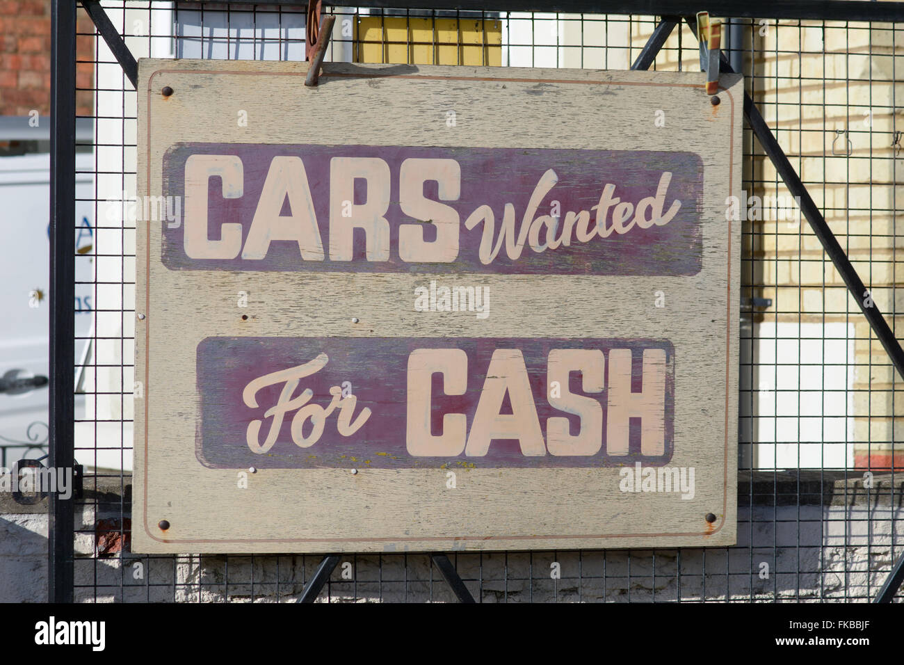 Cars Wanted for Cash sign outside Garage selling Second Hand cars Stock ...