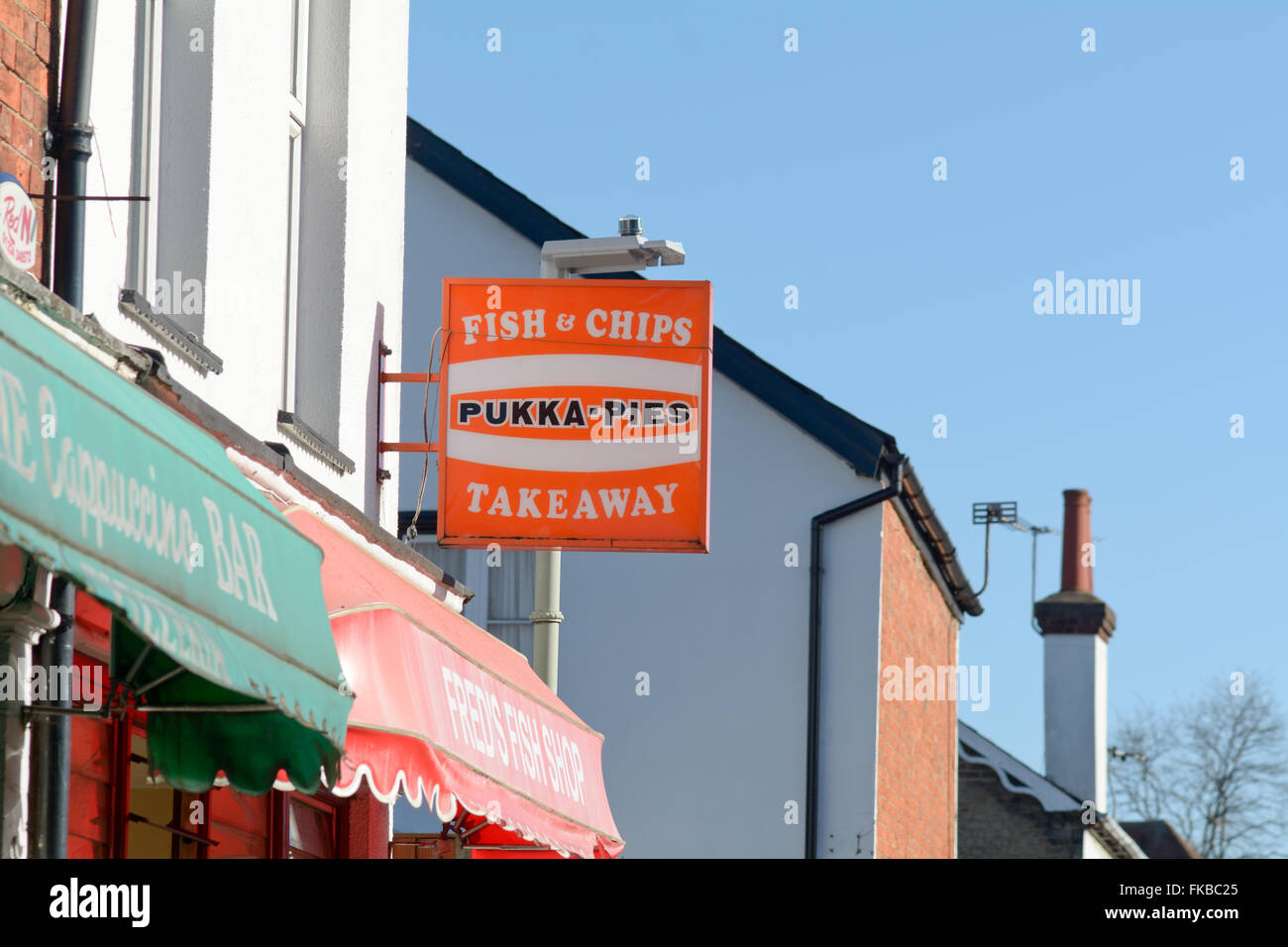 Pukka Pies sign outside Fish and Chips shop in Bedford, Bedfordshire ...
