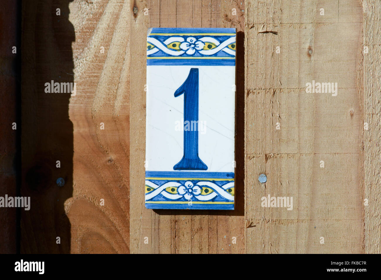 House number 1 sign on fence Stock Photo - Alamy