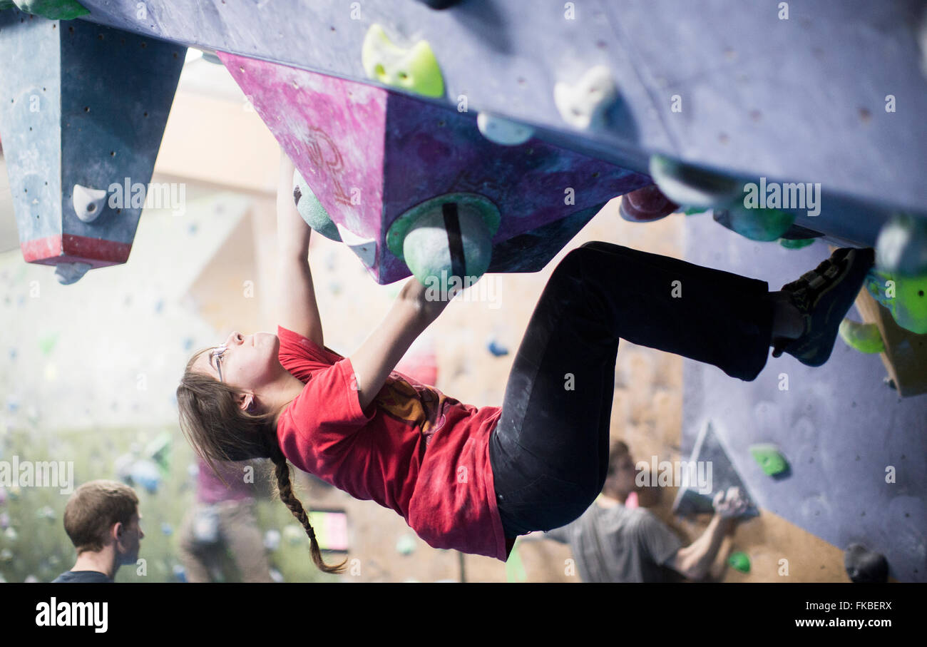 Climbers take part in a bouldering competition at The Climbing Academy ...