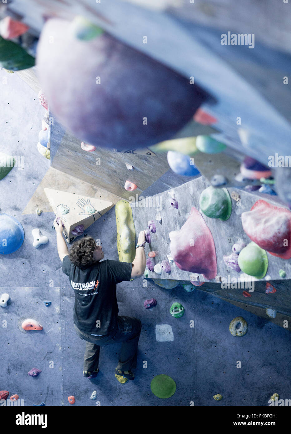 Climbers take part in a bouldering competition at The Climbing Academy ...