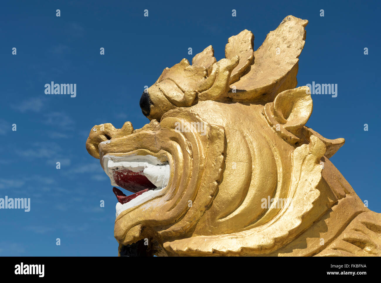Golden Chinthe (Lion deity) statue at Aung Theikdi Zedi Pagoda in ...