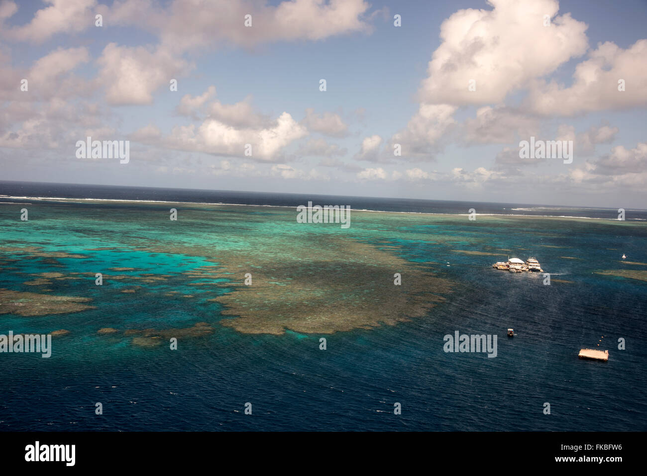 A large floating platform, anchored on the Agincourt Reefs. Moored ...