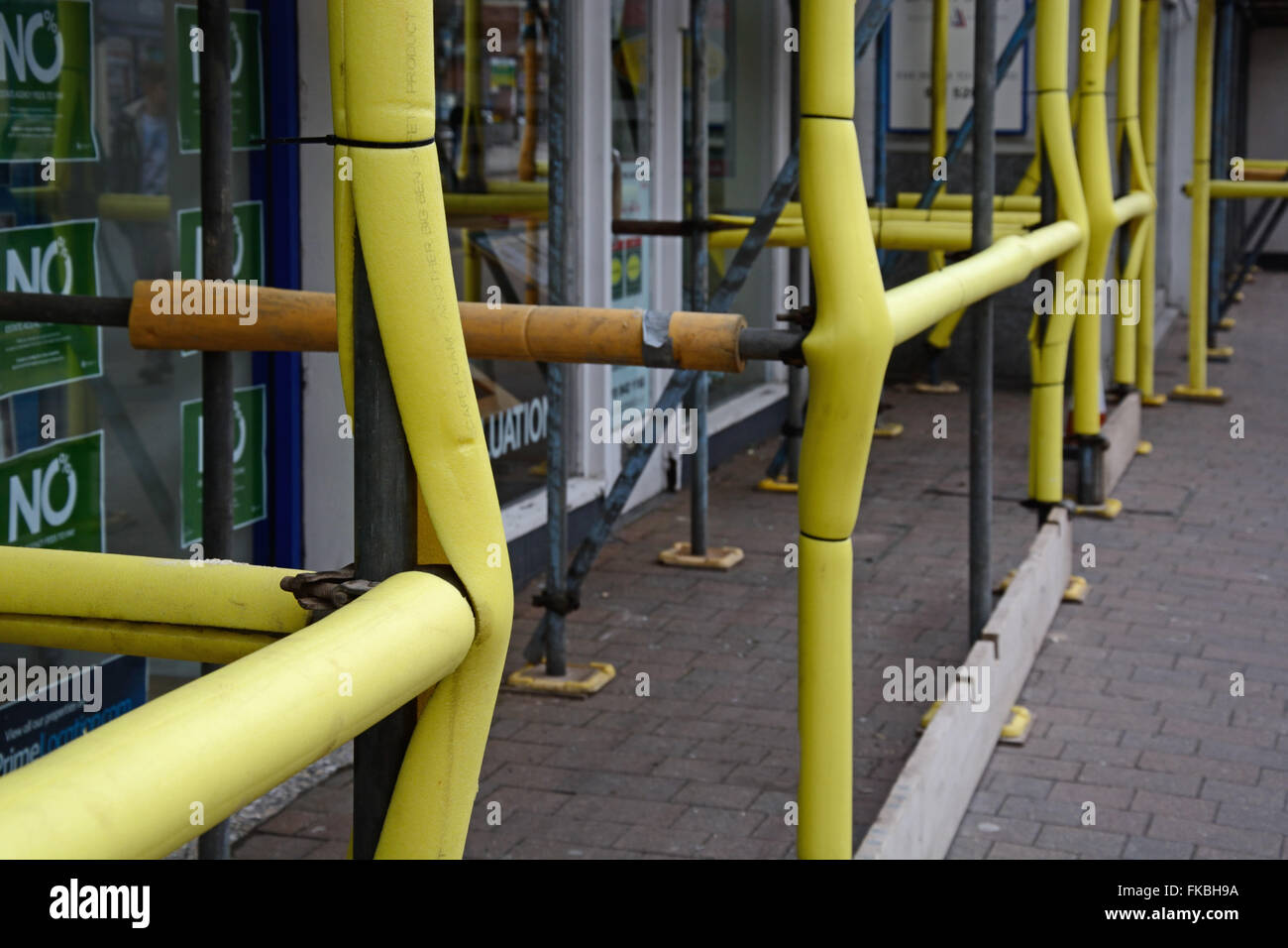 scaffolding with padding for safety. Beeston Nottingham Stock Photo - Alamy