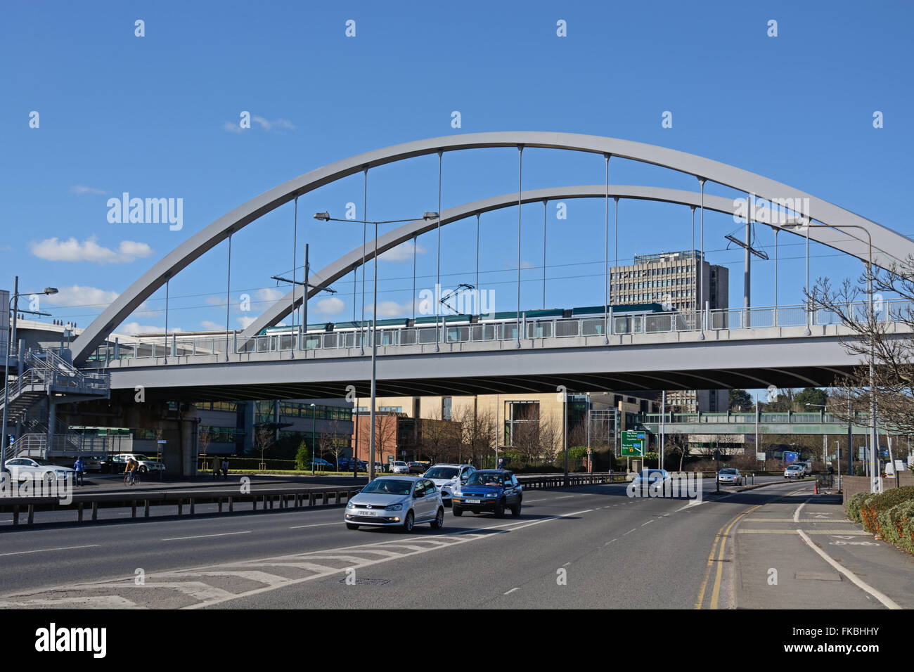 Tram bridge at Queens Medical Centre, Nottingham, England Stock Photo ...