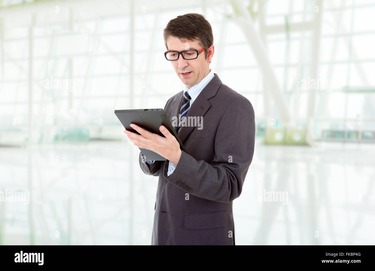 businessman using touch pad of tablet pc, at the office Stock Photo - Alamy