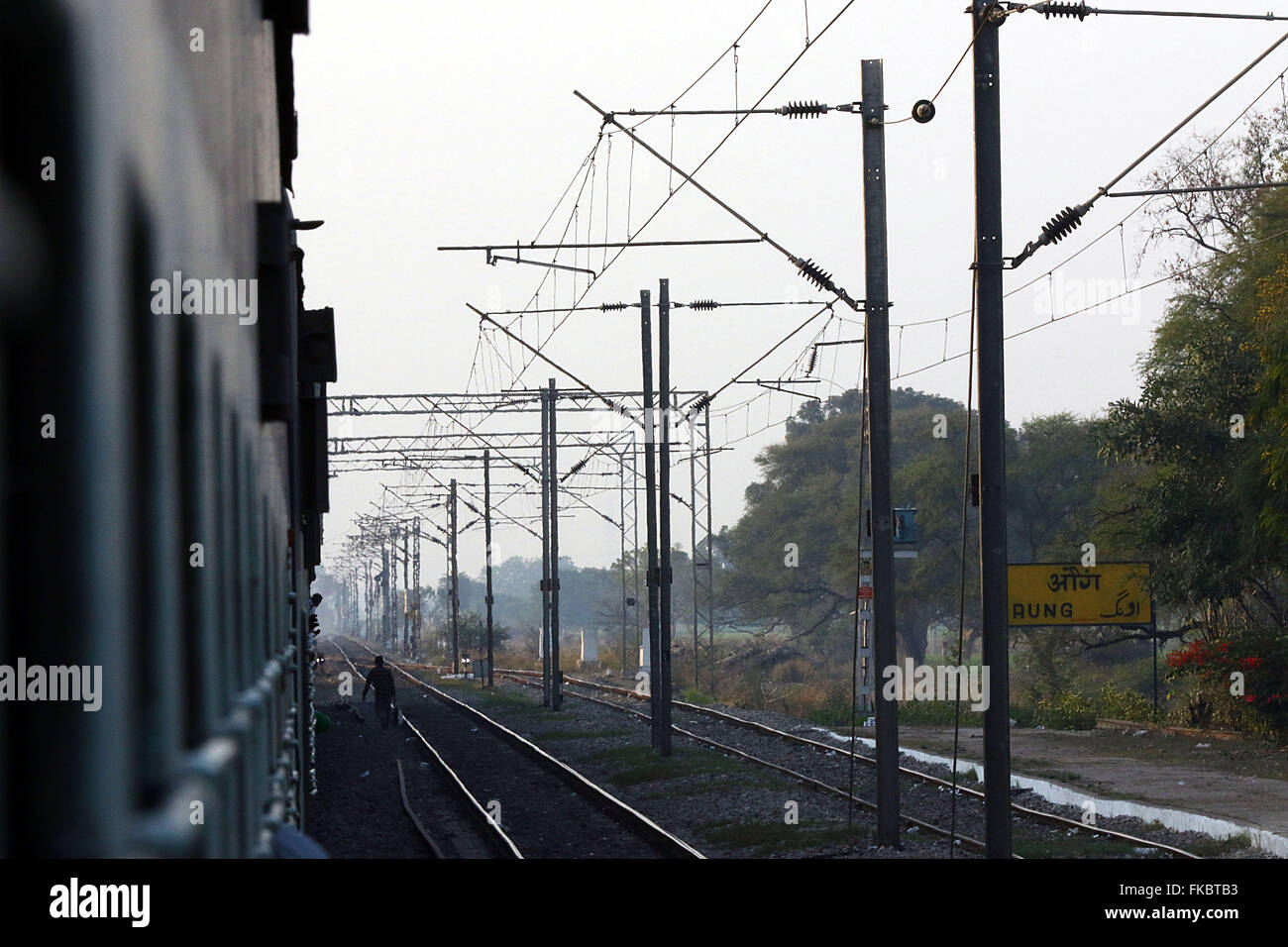 Railway tracks overhead electric poles hi-res stock photography and ...