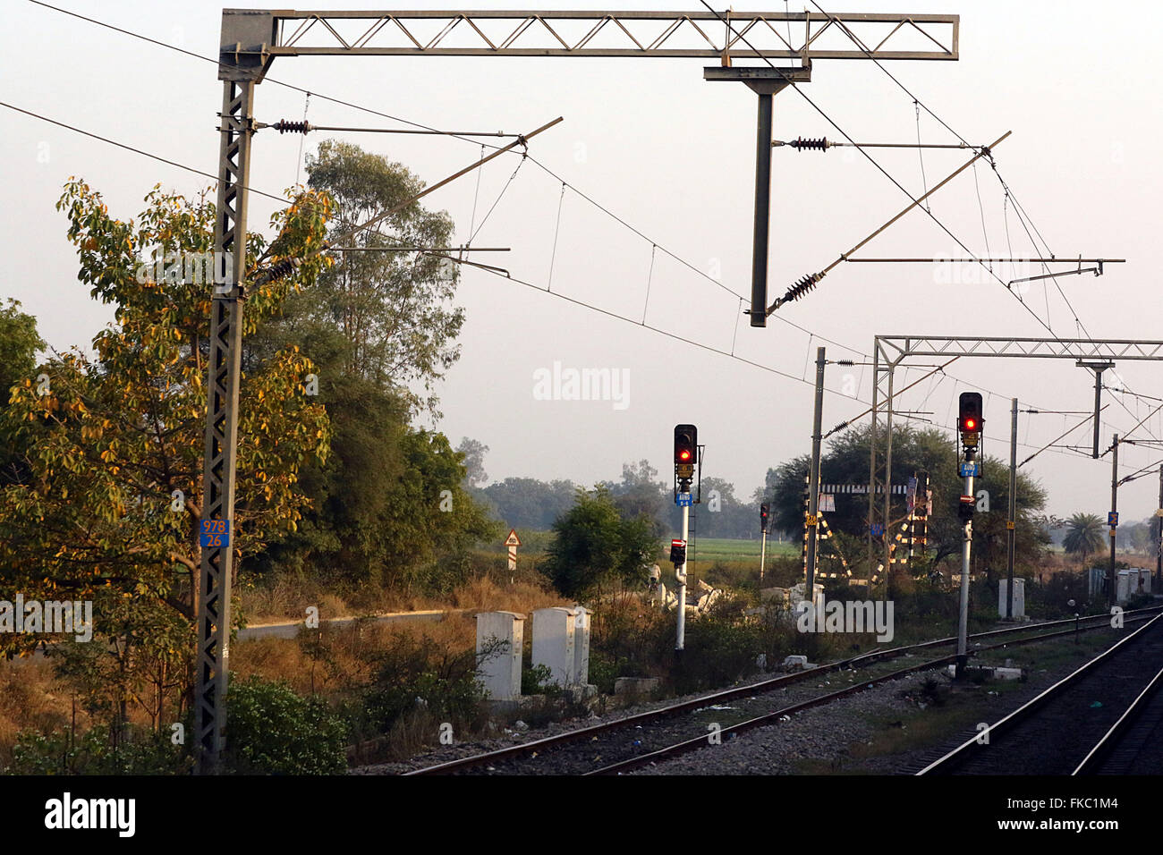 Railway tracks overhead electric poles hi-res stock photography and ...