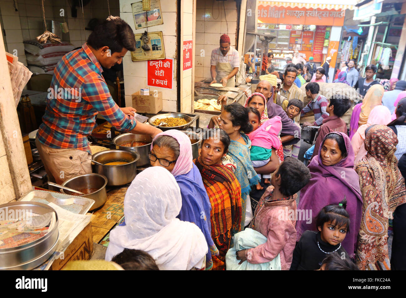 India 13 Feb 2016. Beggars waiting for leftovers in front of ...