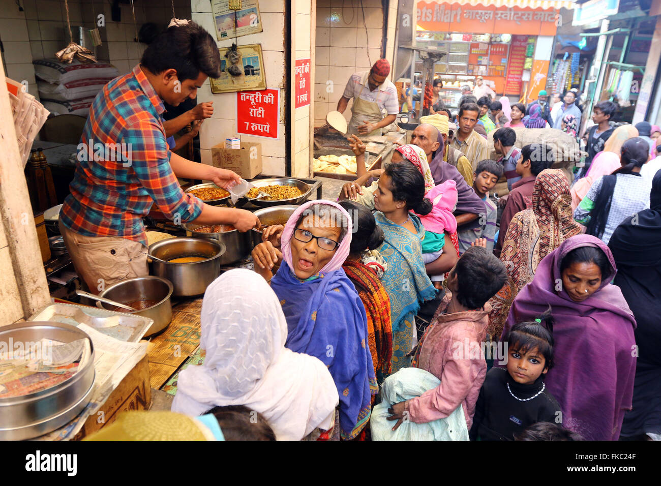 India 13 Feb 2016. Beggars waiting for leftovers in front of ...