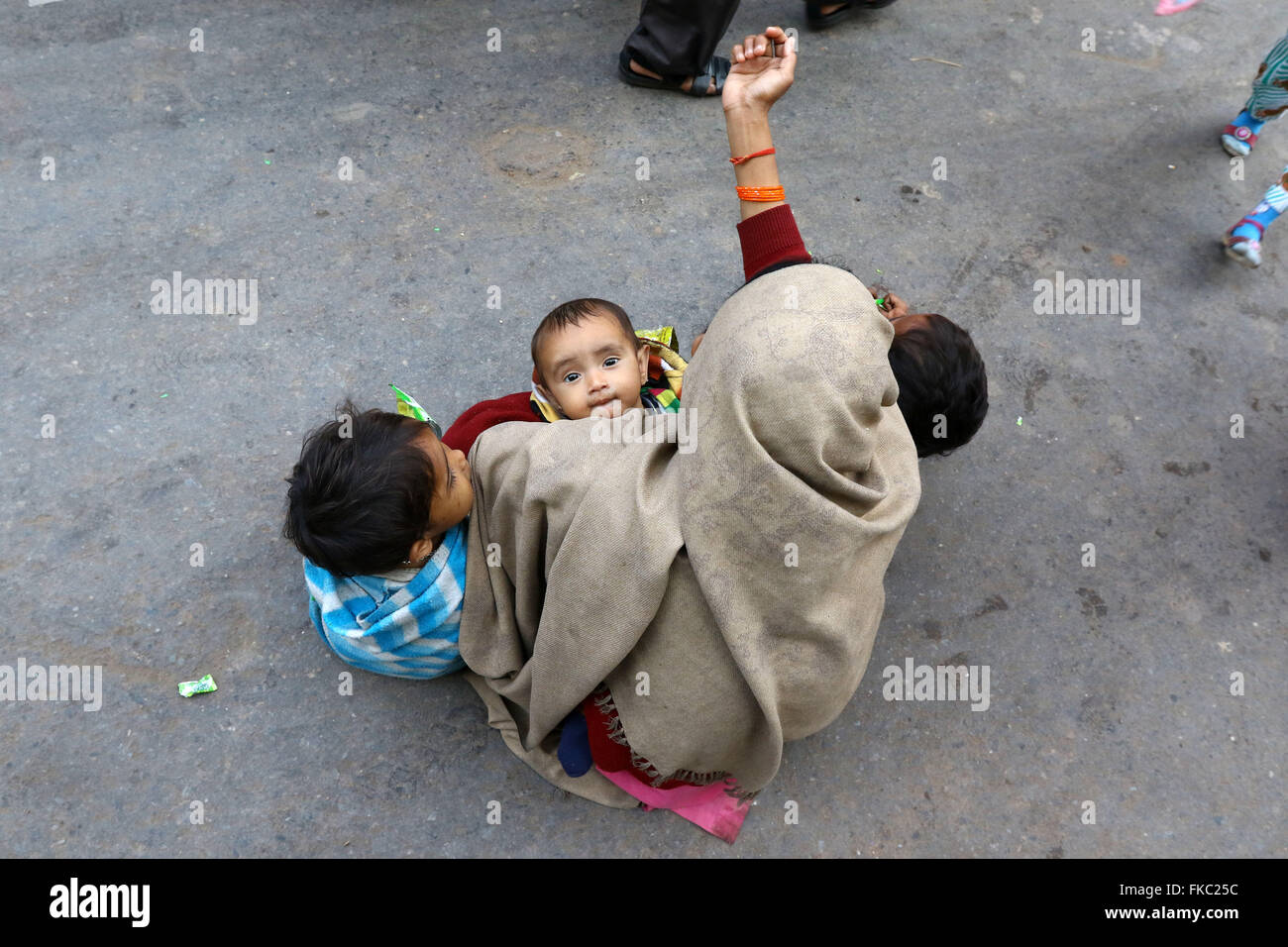 Children begging for alms india hi-res stock photography and images - Alamy