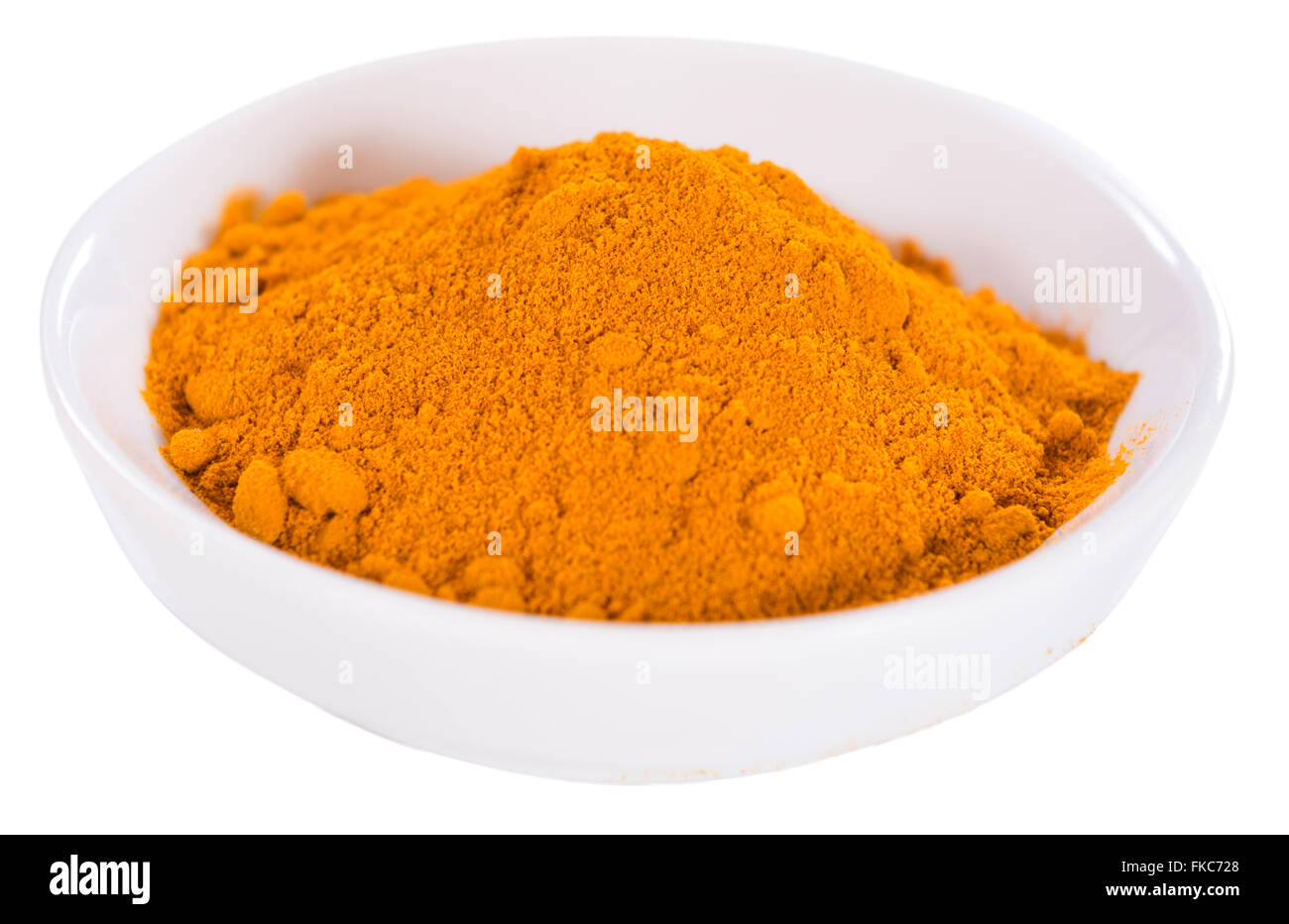 Turmeric (close-up shot, selective focus) isolated on white background ...