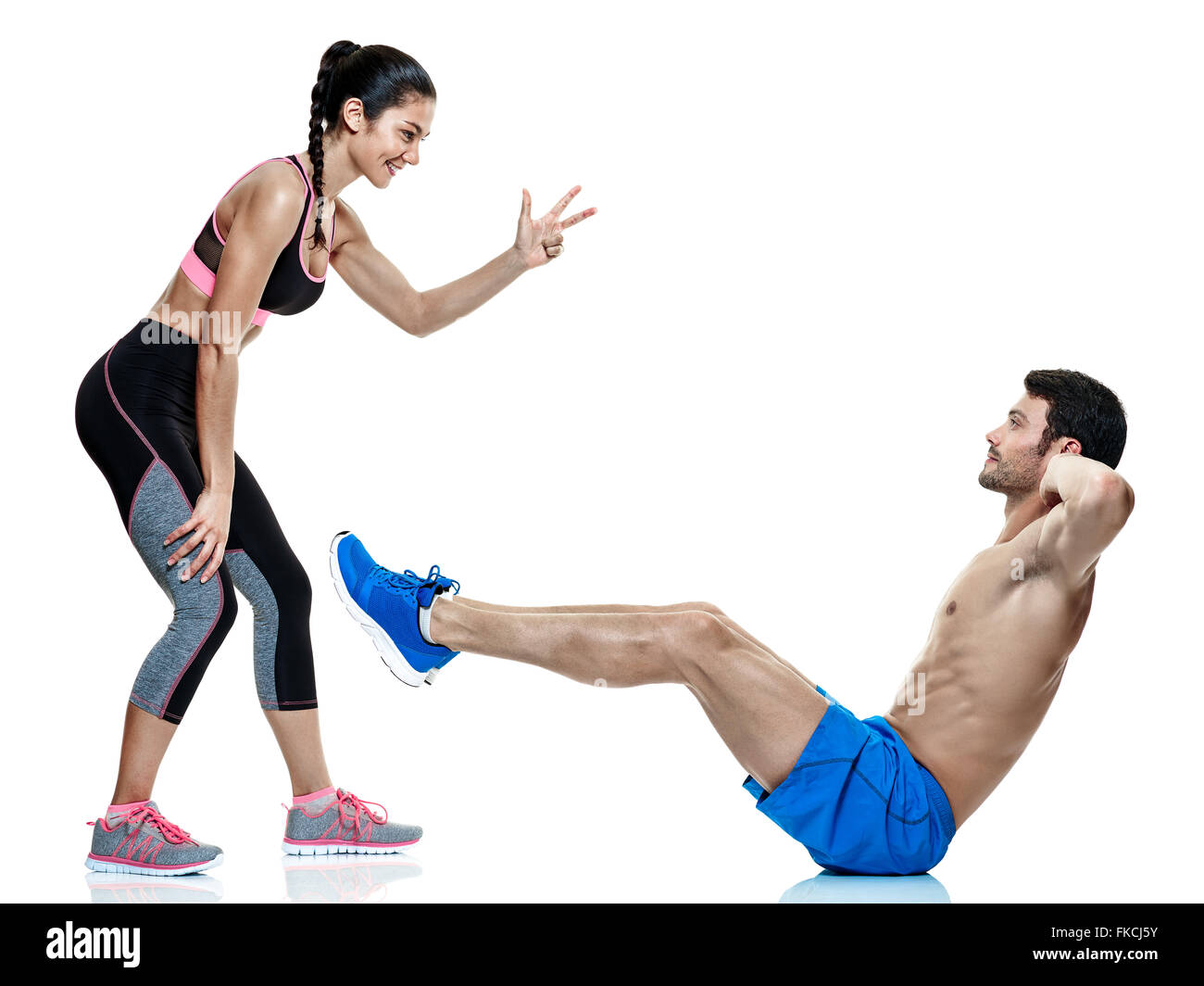 one caucasian couple man and woman exercising fitness exercises ...