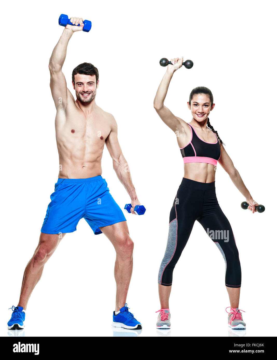 one caucasian couple man and woman exercising fitness exercises ...