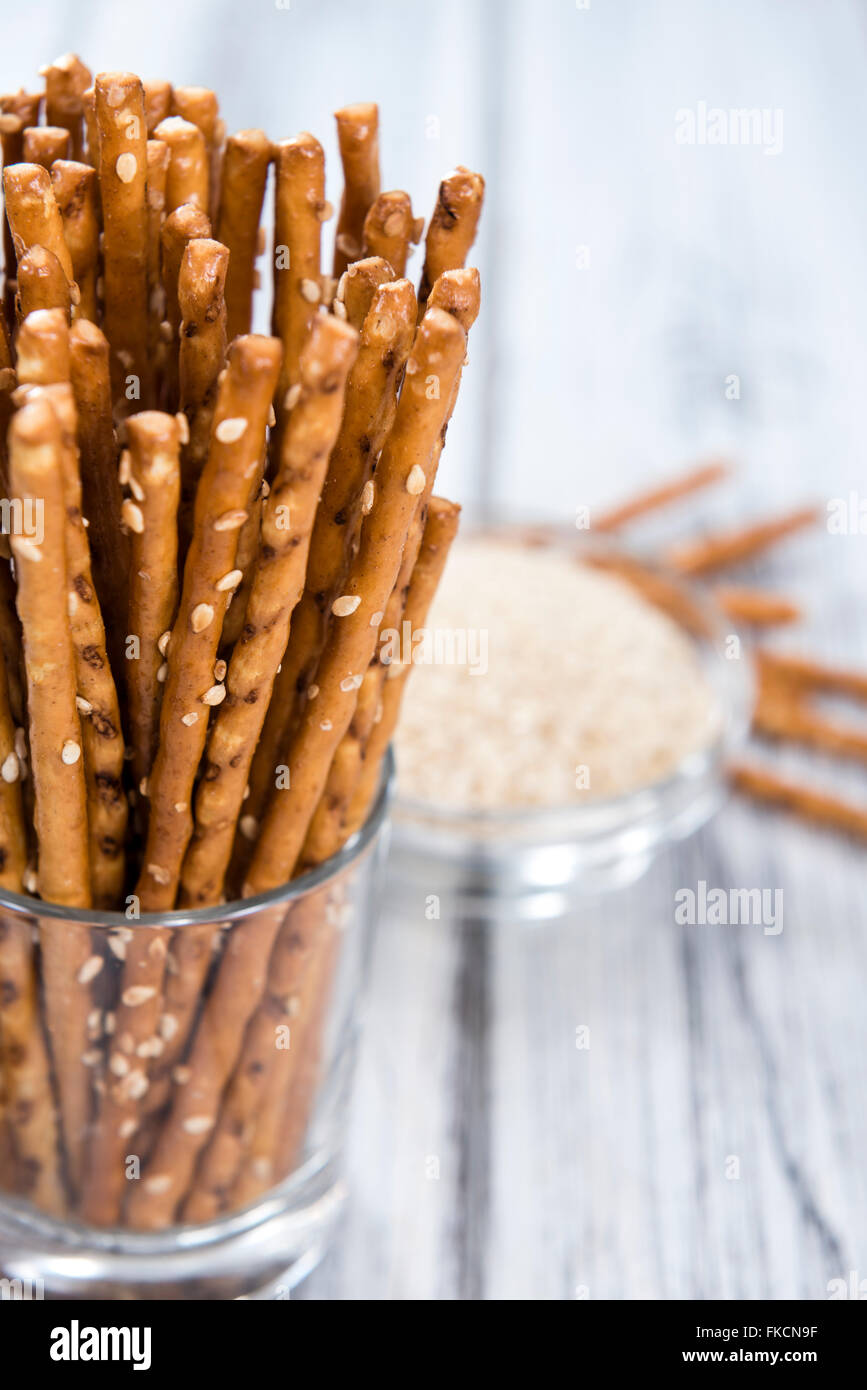 Sesame Sticks (close-up shot) on wooden background Stock Photo - Alamy