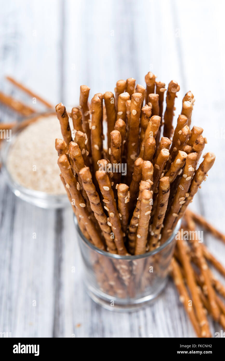 Sesame Sticks (close-up shot) on wooden background Stock Photo - Alamy