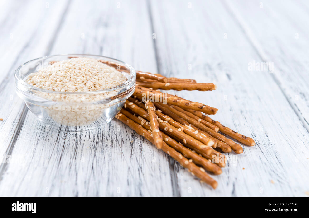 Sesame Sticks (close-up shot) on wooden background Stock Photo - Alamy