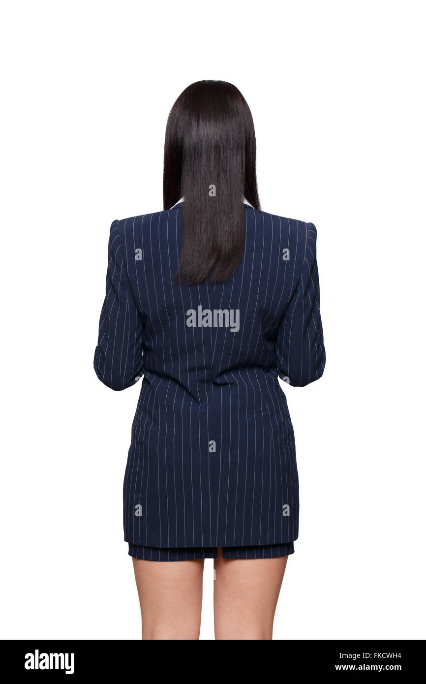 Businesswoman in formal wear from behind, back view, isolated on white ...