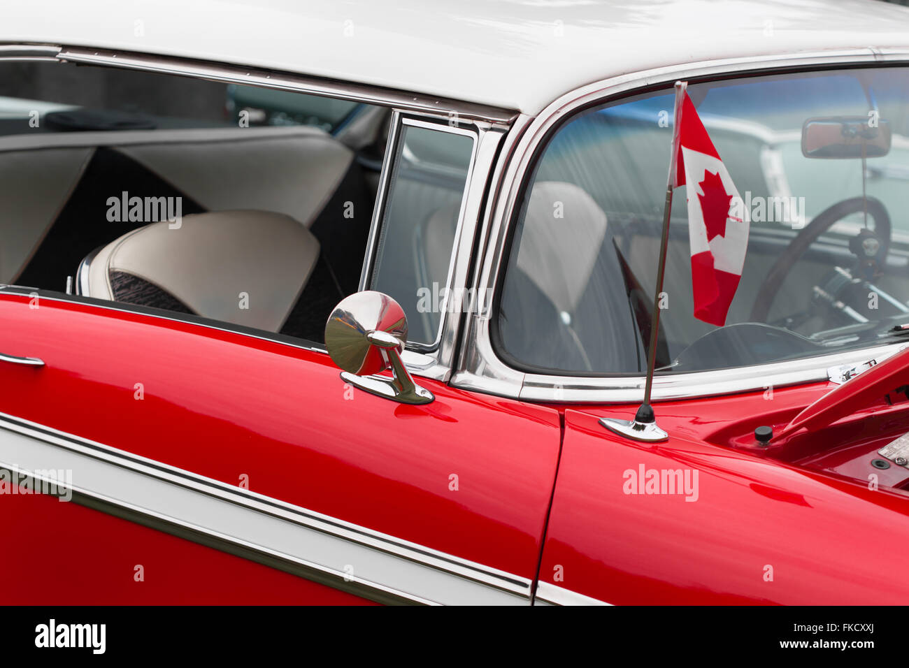 Canadian flag on bonnet of a red classic vintage car Stock Photo - Alamy